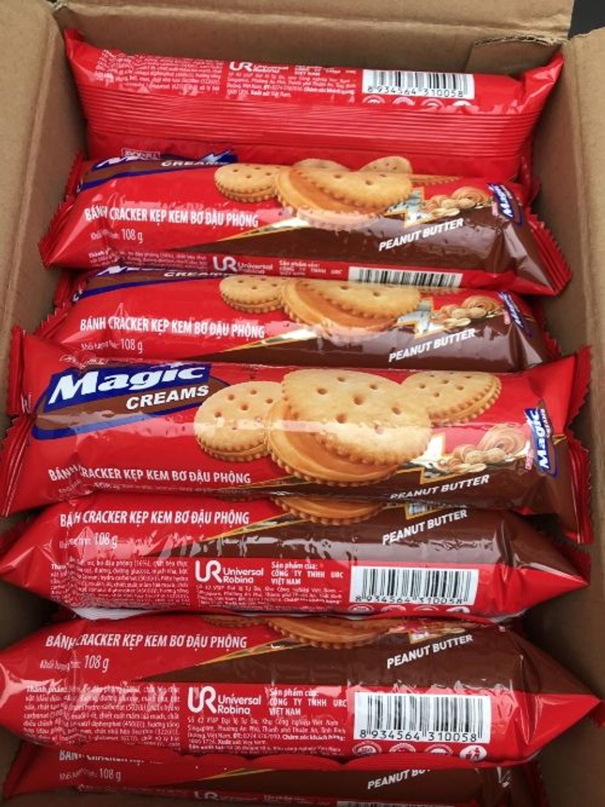 Bánh Cracker Kẹp Kem Bơ Đậu Phộng Magic ( Creams Peanut Butter ) cây 108g Thùng 24 cây giá sỉ ...